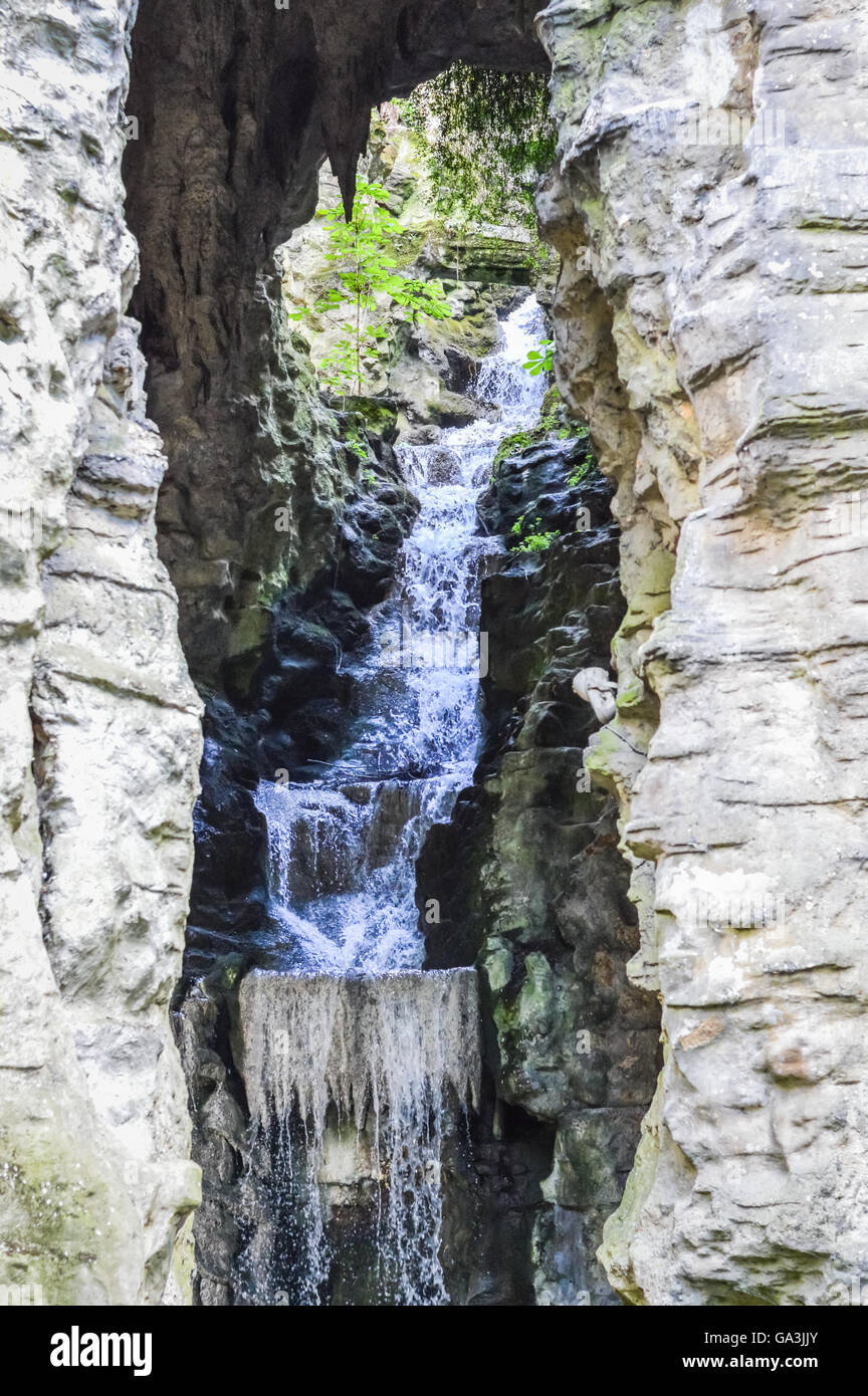 waterfall in a cave in the park "Buttes-Chaumont" in Paris - France ...
