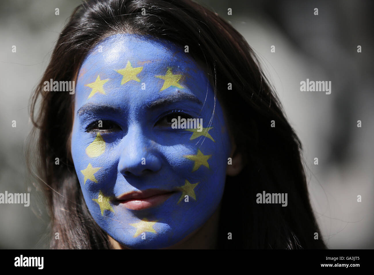 A Remain supporter with the European Union flag painted on her face in ...