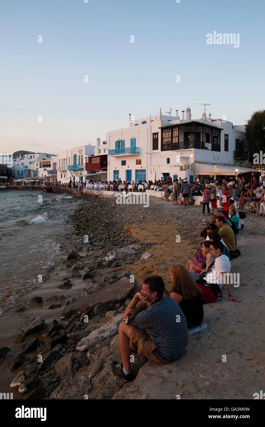 People at the beach, watching sunset, Little Venice, Mykonos Town or ...