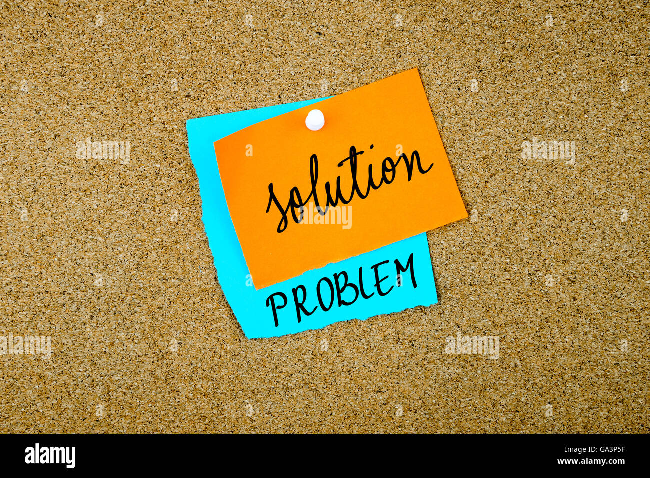 Solution Problem written on paper notes pinned on cork board with white ...