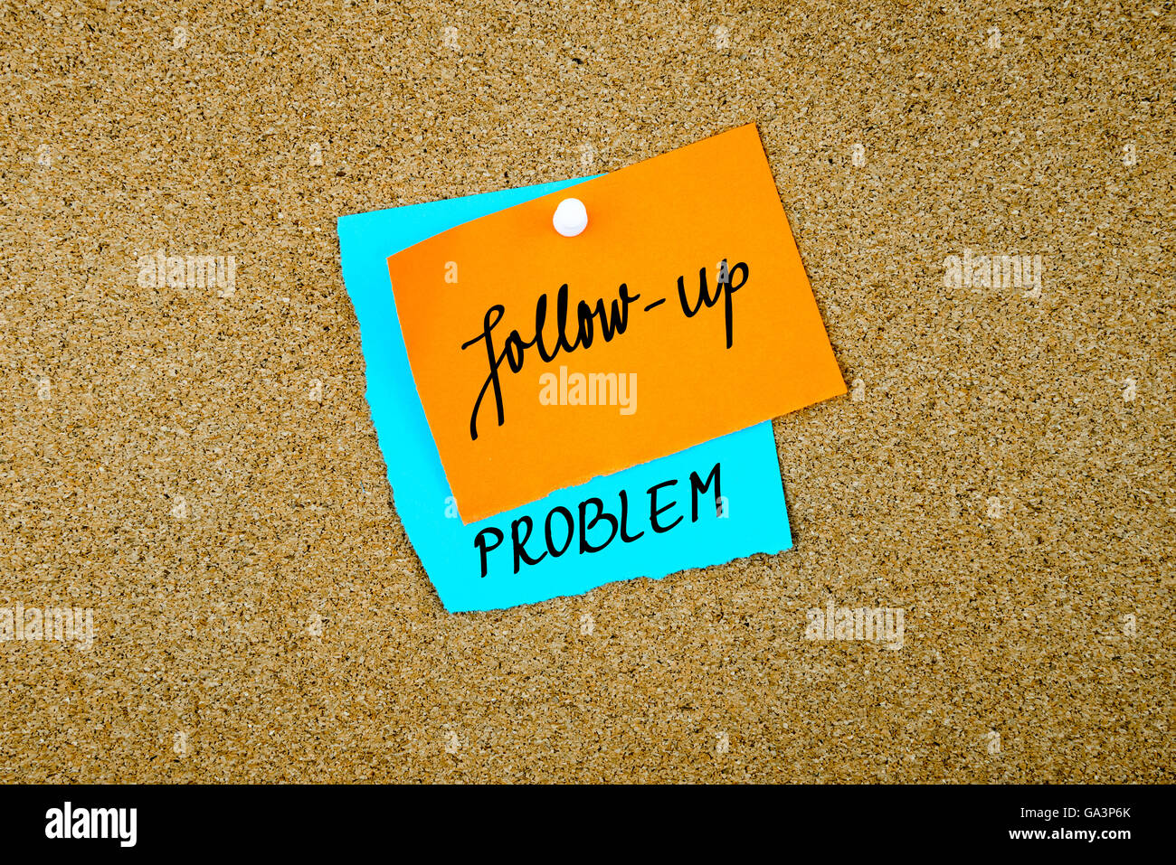 Follow-Up Problem written on paper notes pinned on cork board with ...