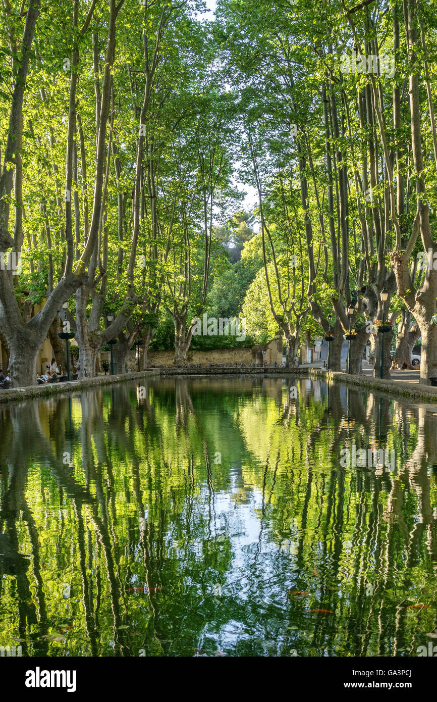 The long pond in the hill top village of Cucuron in the Luberon ...