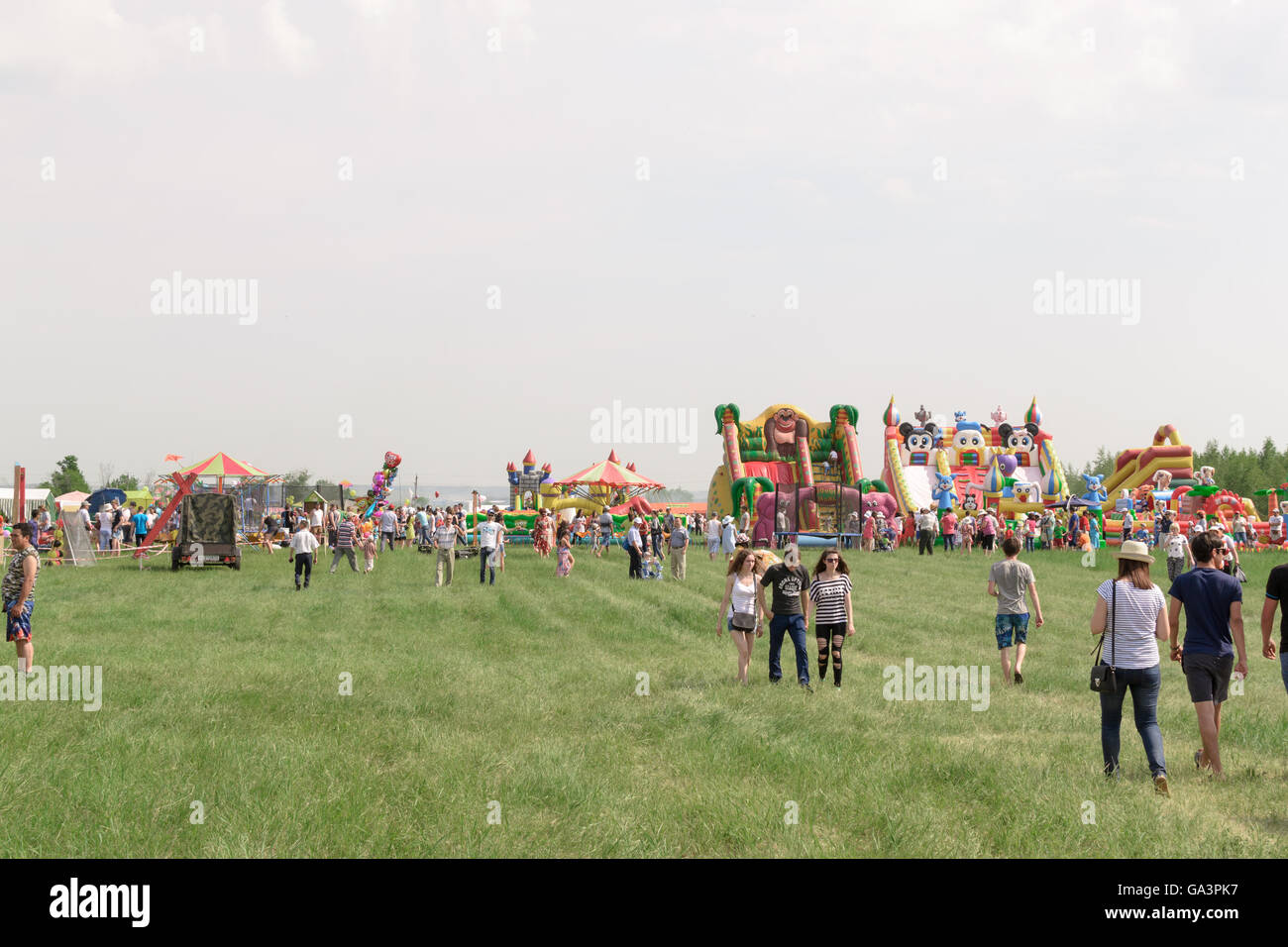 Crowd of people at an outdoor fun park in Russia Stock Photo - Alamy