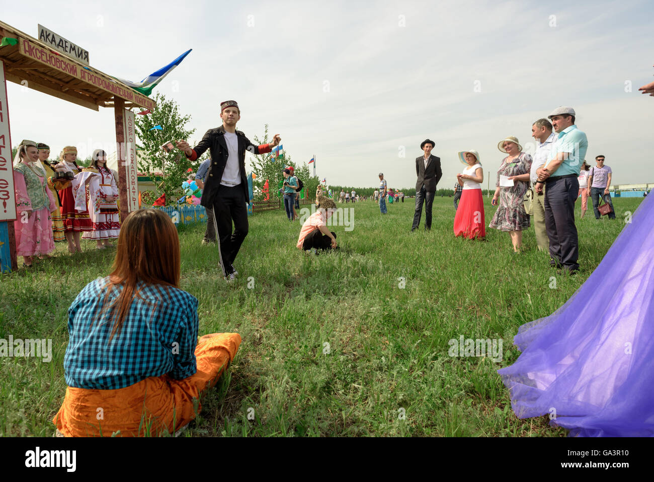 Russian Comedy Performance outside with onlookers Stock Photo - Alamy