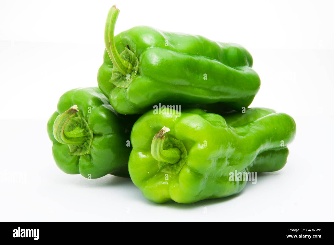 Three Green Pepper Fruits Isolated on White Background Stock Photo - Alamy