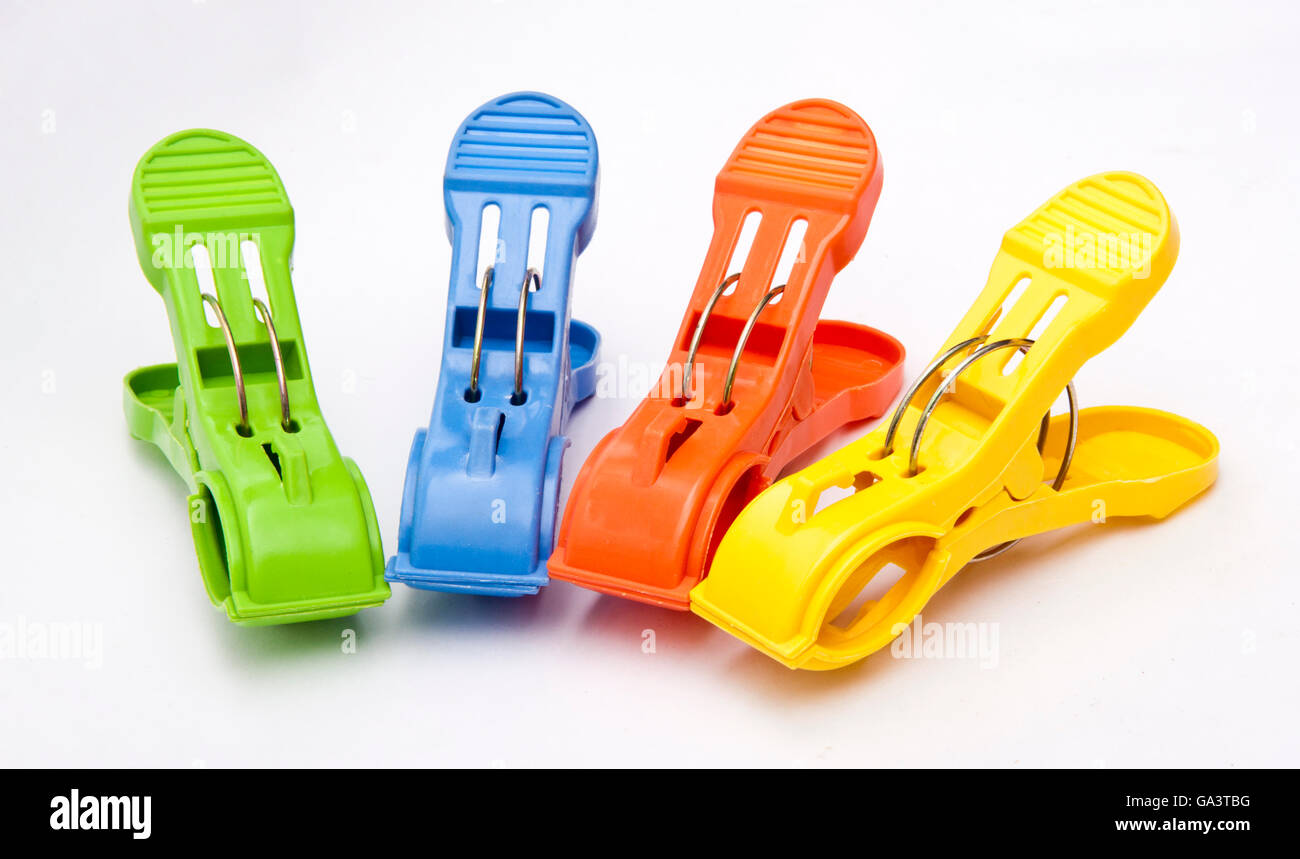 Colorful Clothes Pegs Isolated on White Background Stock Photo - Alamy