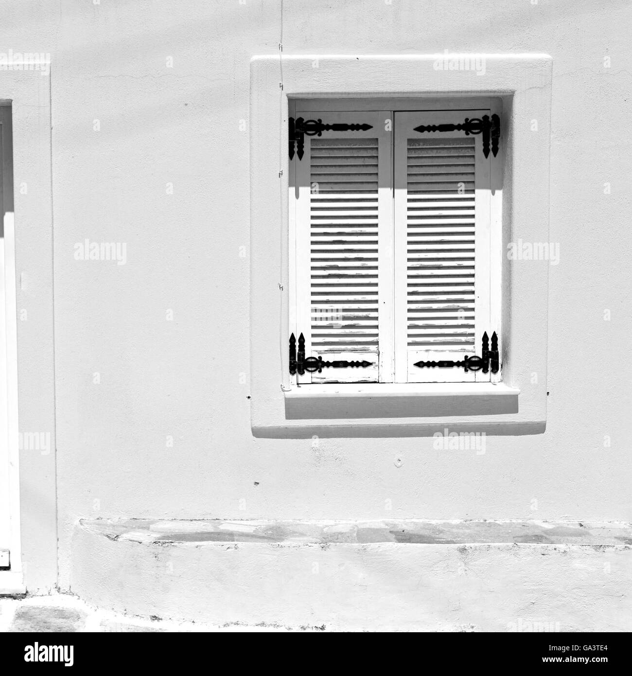 in the greece island window and door white colors old architecture ...