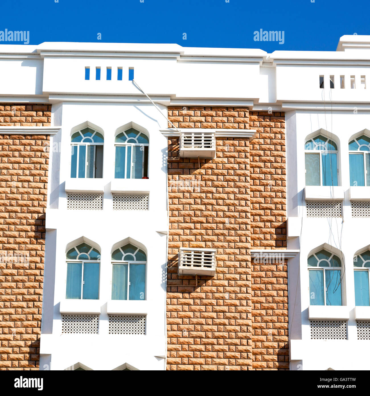 in oman new house brick building the city backgroun sky Stock Photo - Alamy