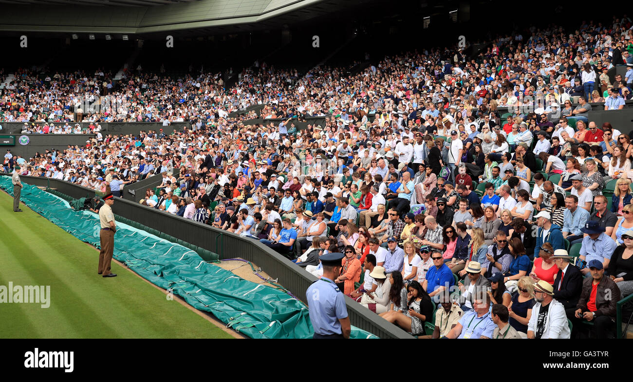 The crowds gather on centre court waiting for the play to start on day ...