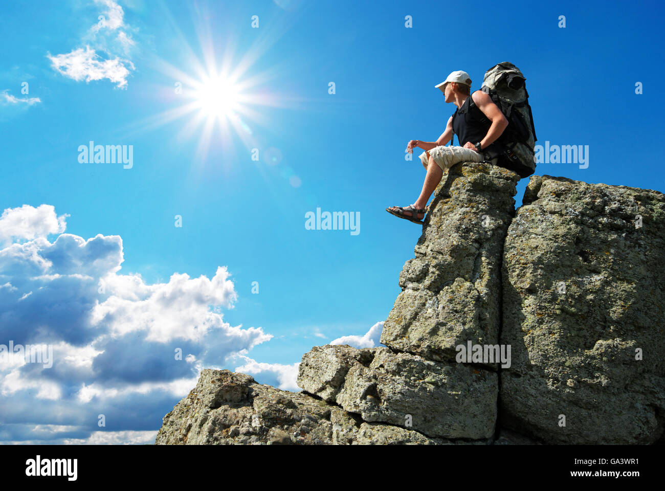 People Sitting On Cliff Top High Resolution Stock Photography and ...