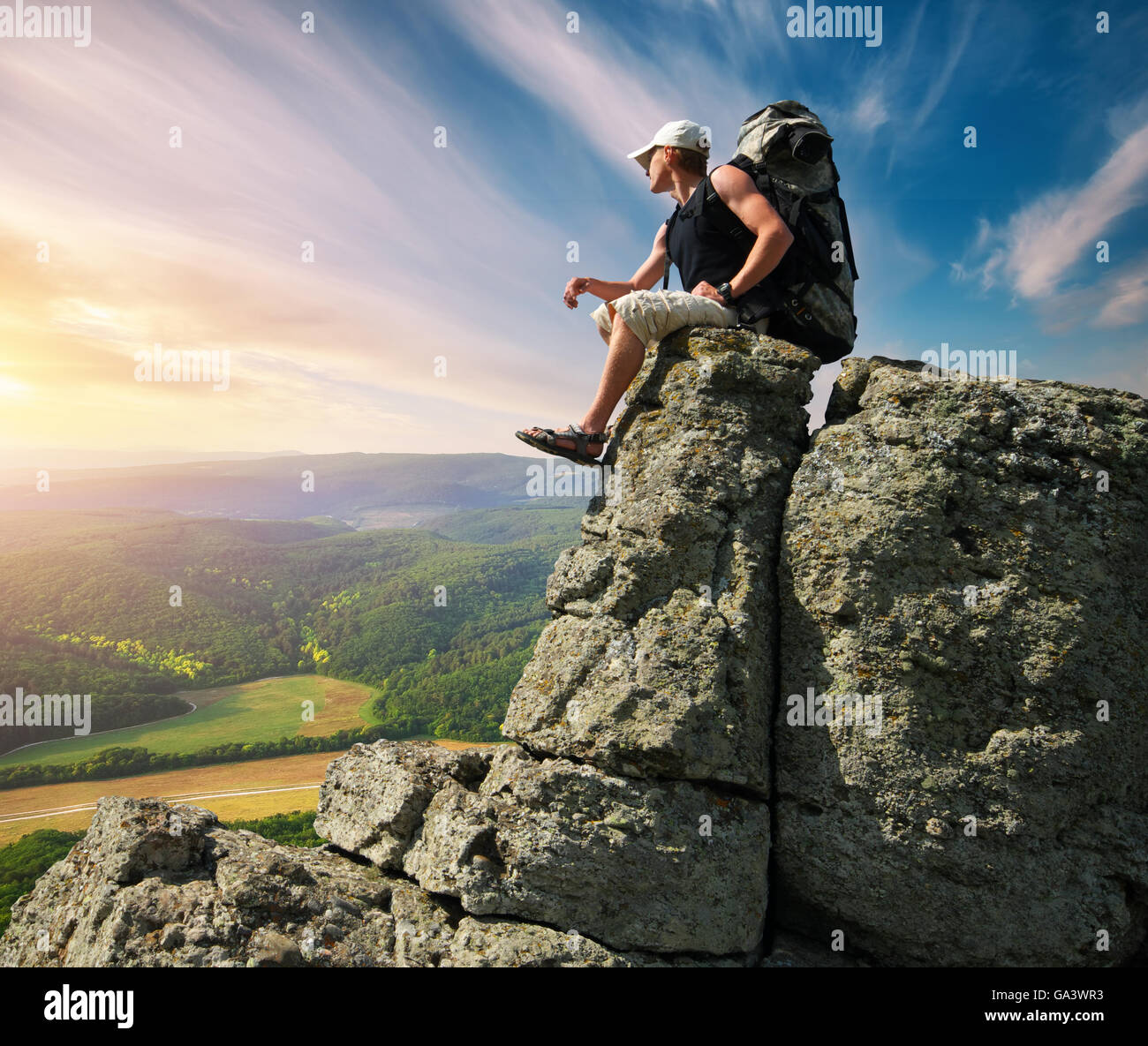 People Sitting On Cliff Top High Resolution Stock Photography and ...