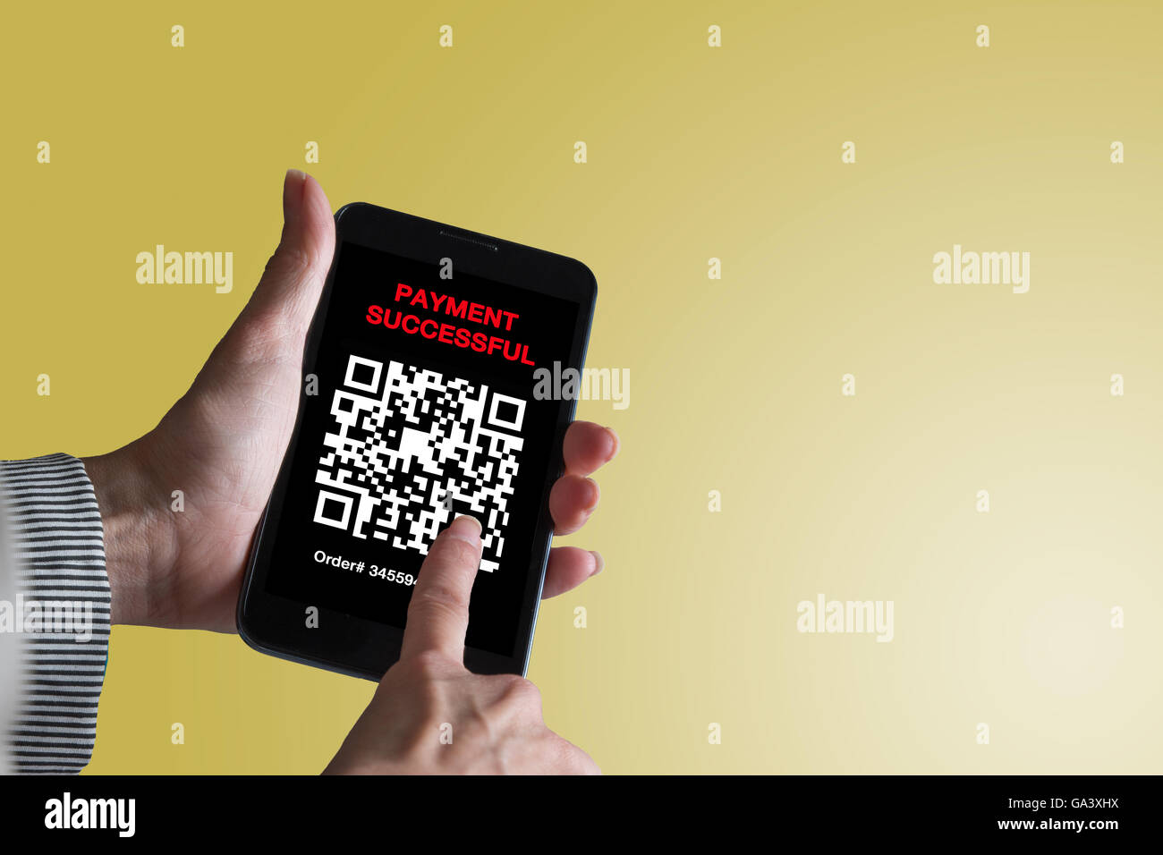 QR code, successful payment via smartphone in hand Stock Photo - Alamy