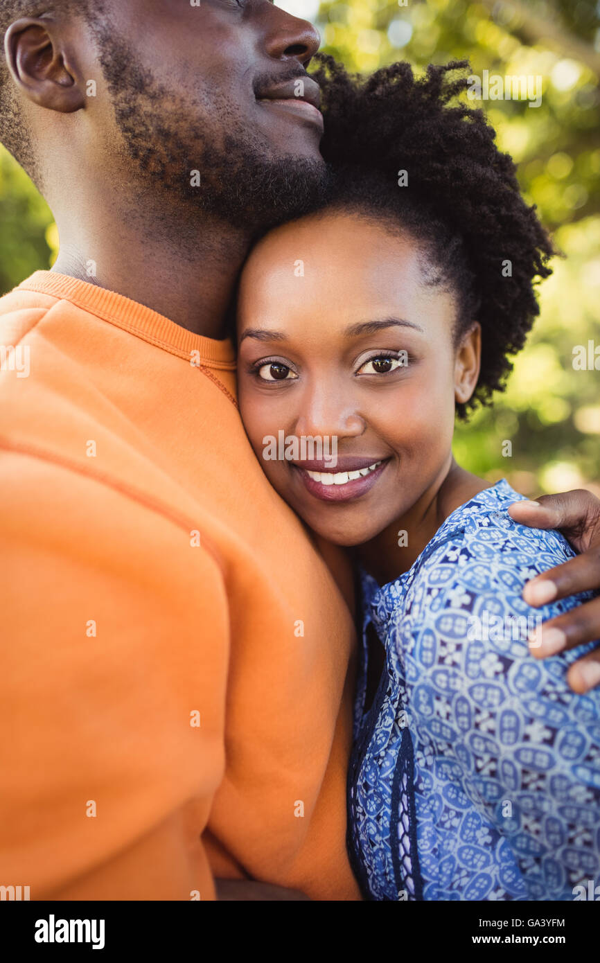 Happy couple posing together Stock Photo - Alamy