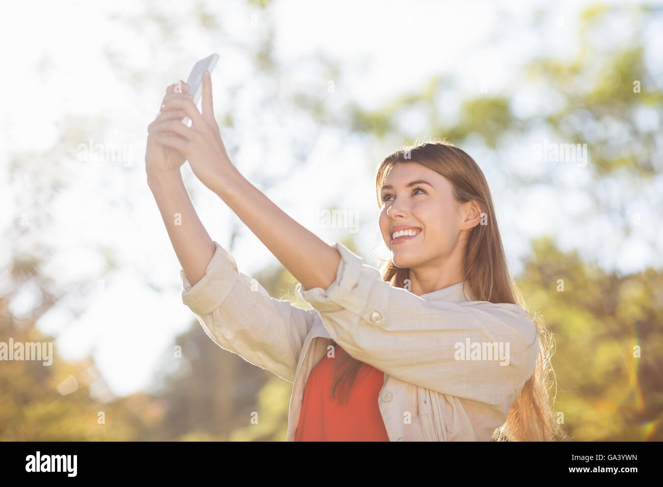 Photographing selfie with mobile phone hi-res stock photography and ...