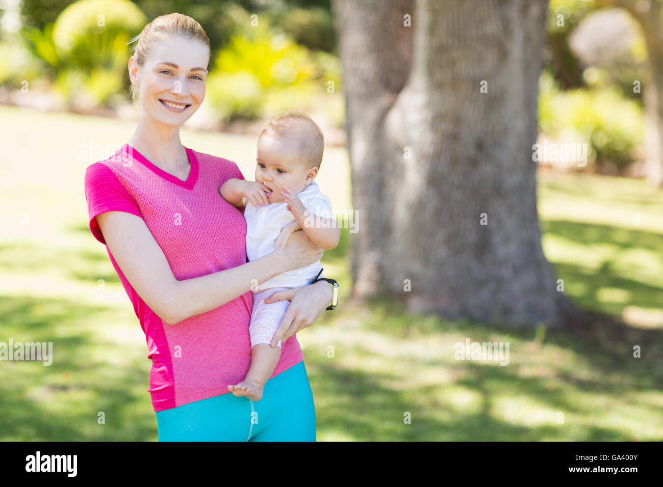 Woman standing baby hi-res stock photography and images - Alamy