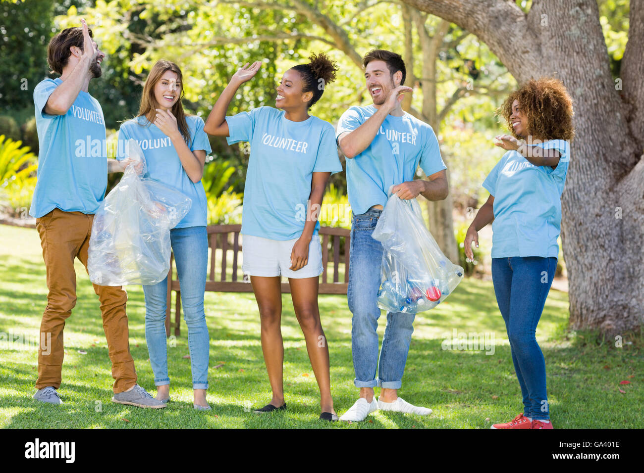 Group of volunteer having fun Stock Photo - Alamy