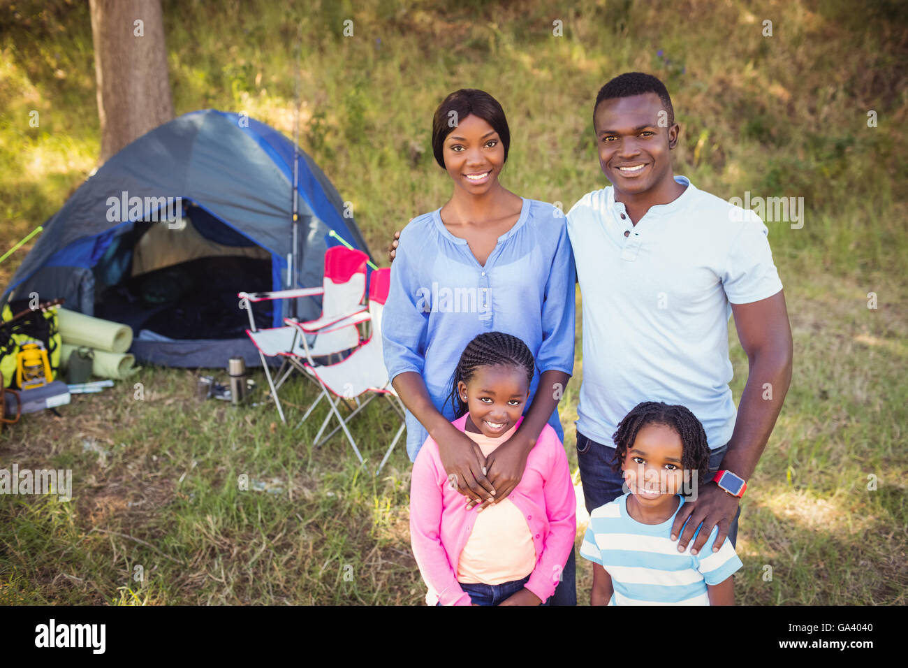 Happy family enjoying together Stock Photo - Alamy
