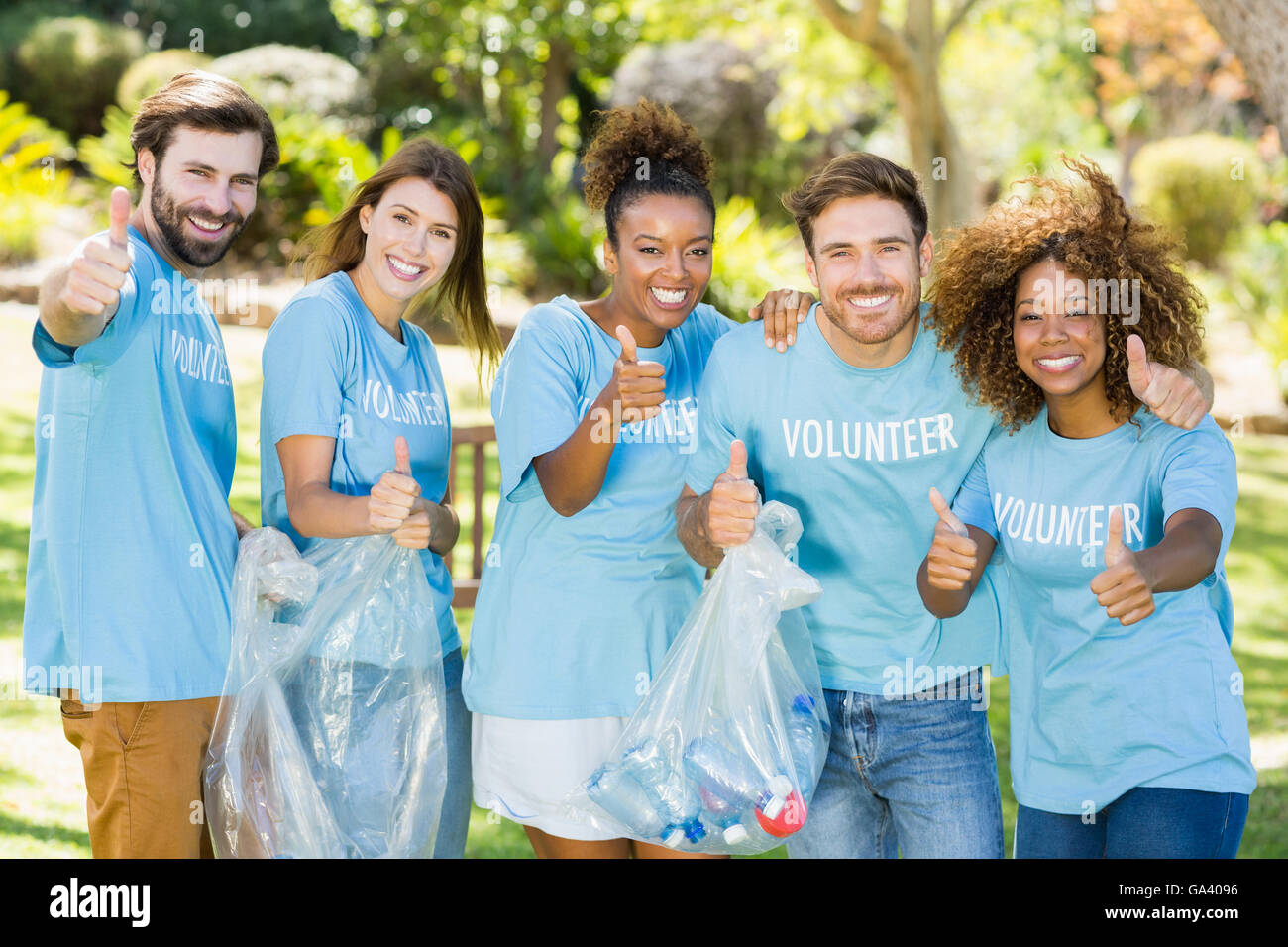 Group of volunteer having fun Stock Photo - Alamy