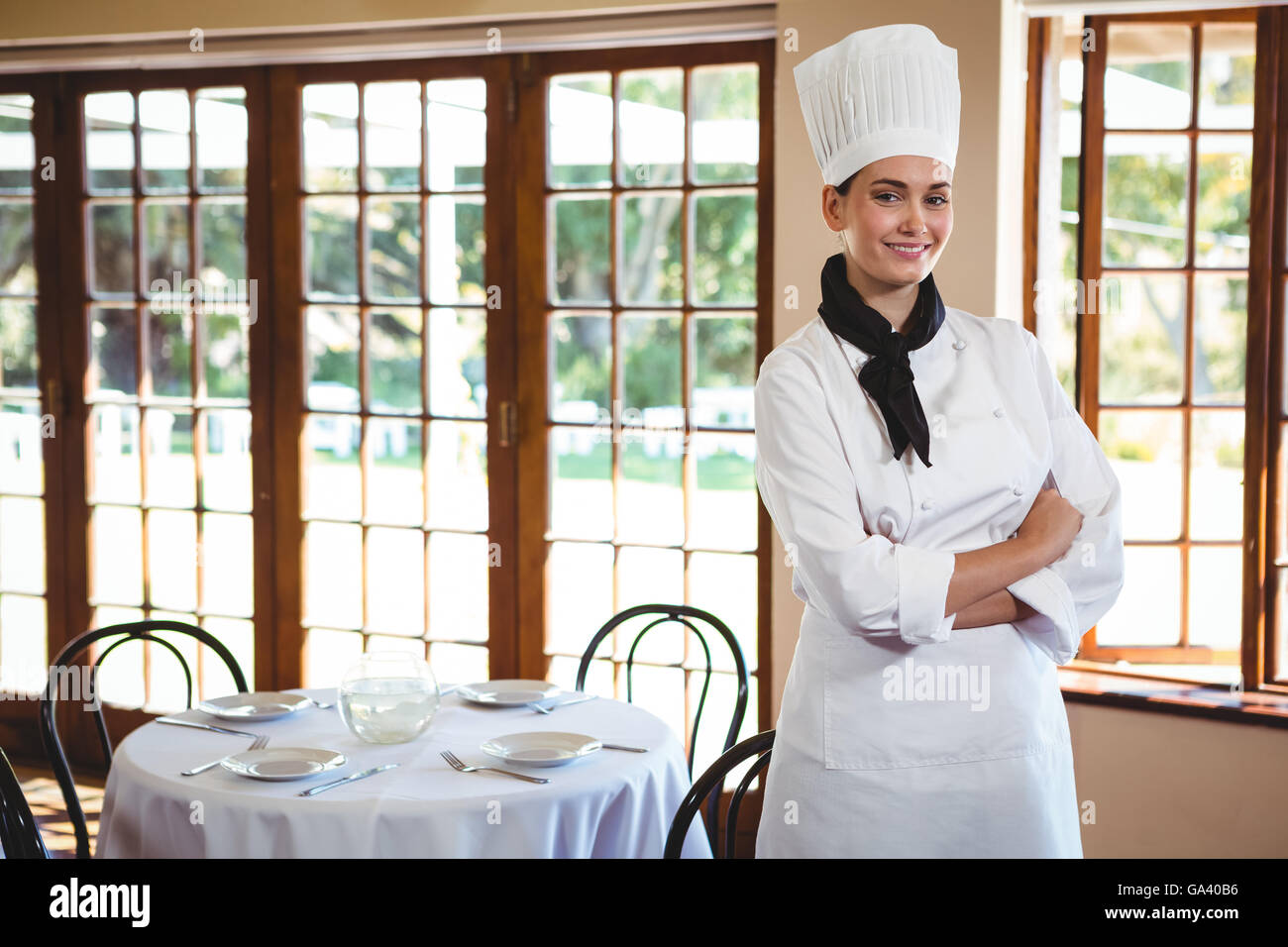 Chef standing and table hi-res stock photography and images - Alamy
