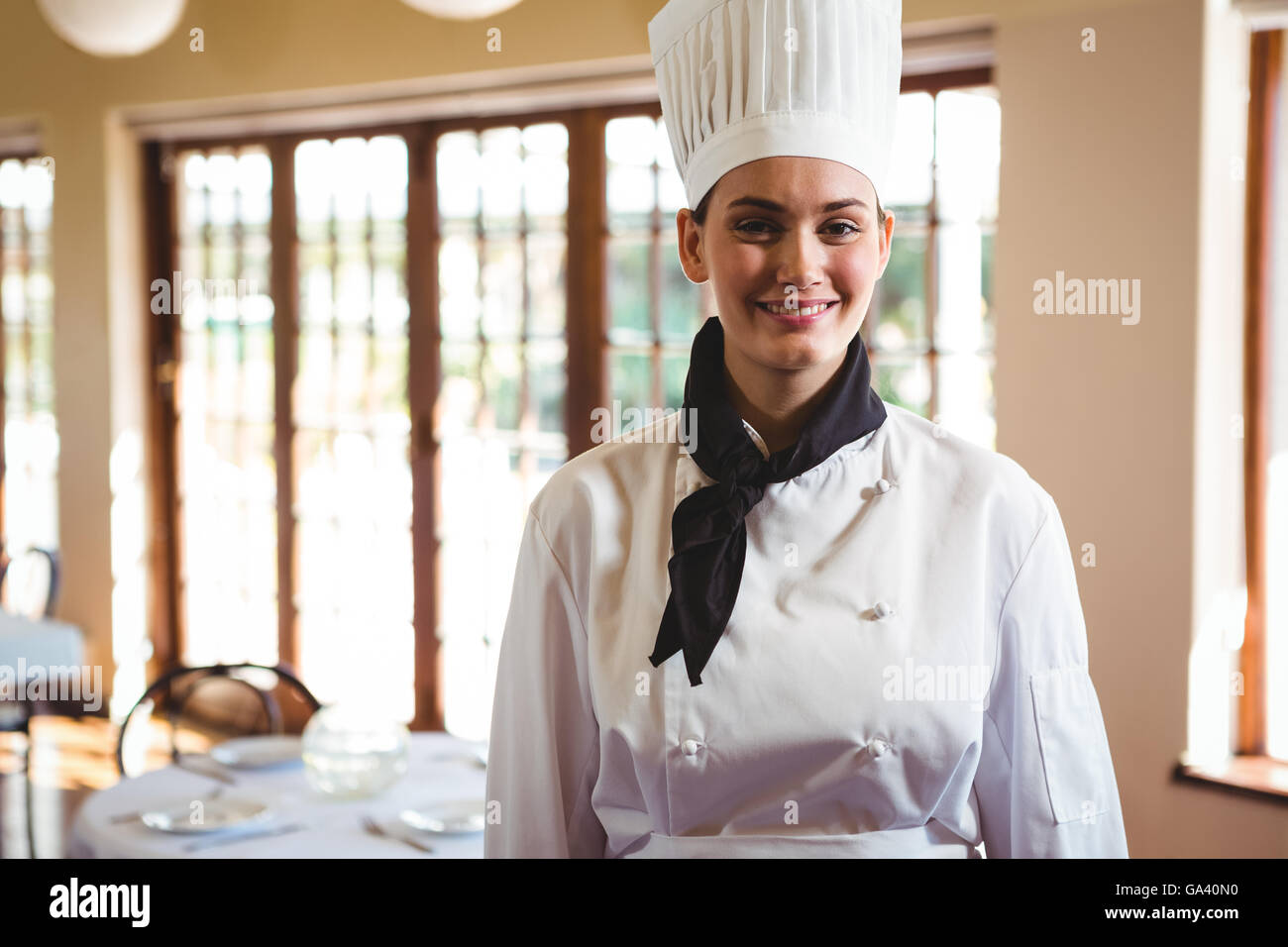 Chef standing with arms crossed Stock Photo - Alamy