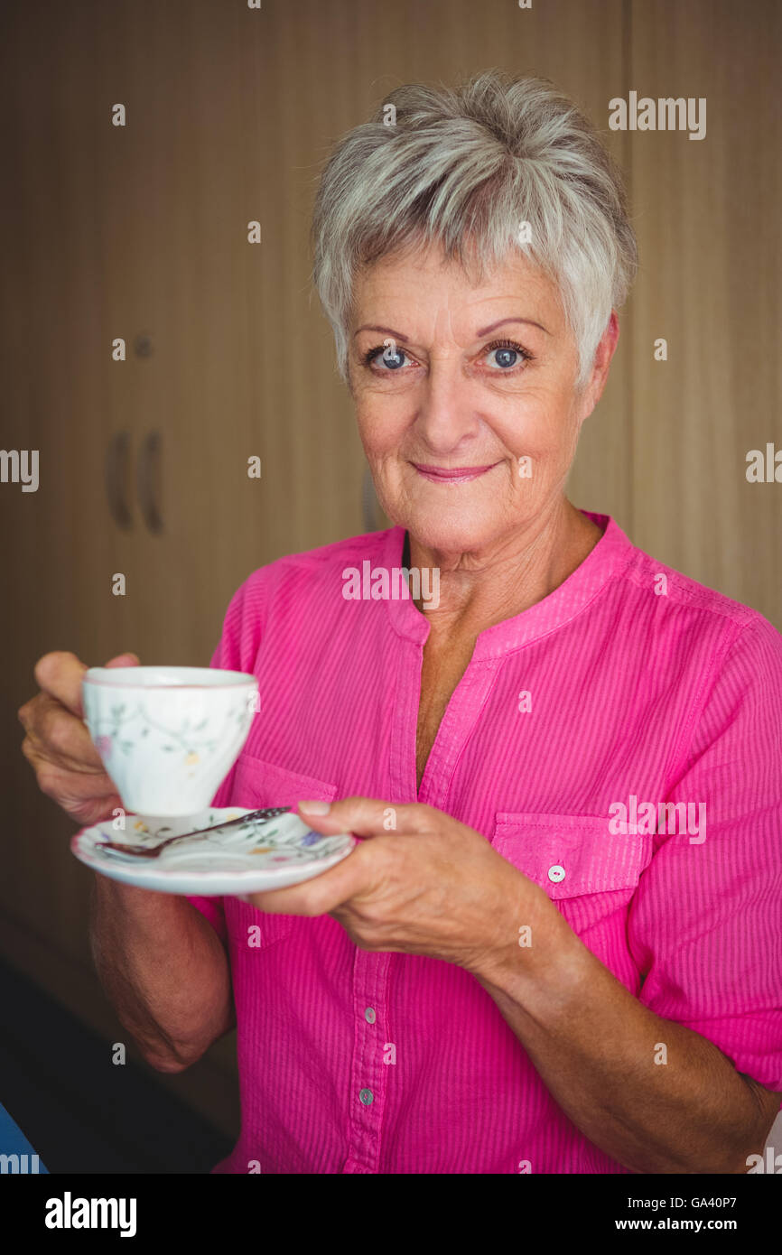 Portrait of a smiling retired woman Stock Photo - Alamy