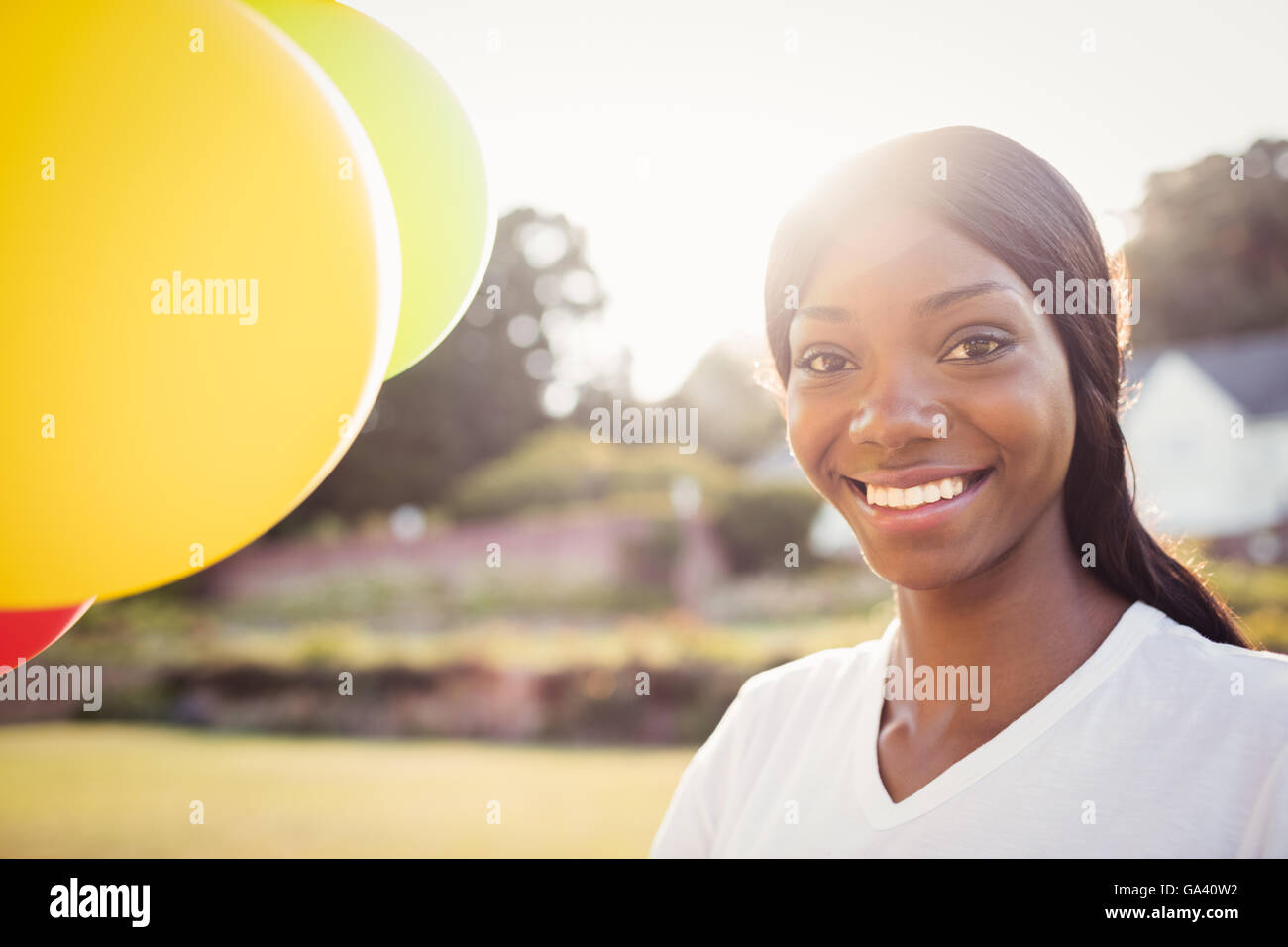 Happy woman posing alone Stock Photo - Alamy