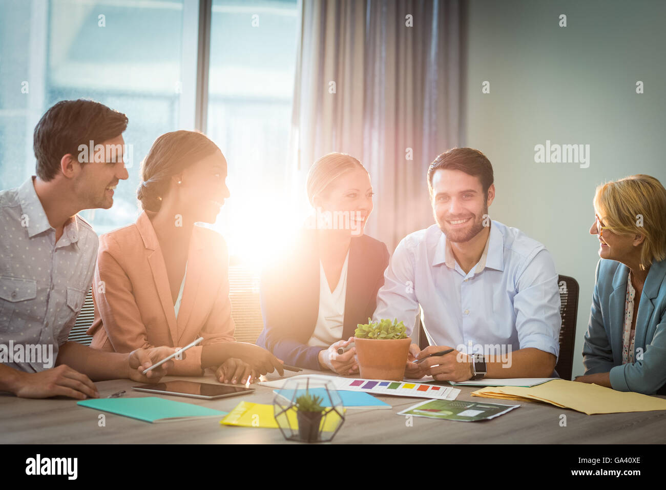 Group happy business people discussing hi-res stock photography and ...