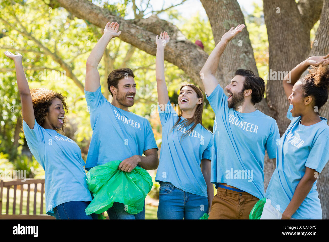 Group of volunteer having fun Stock Photo - Alamy