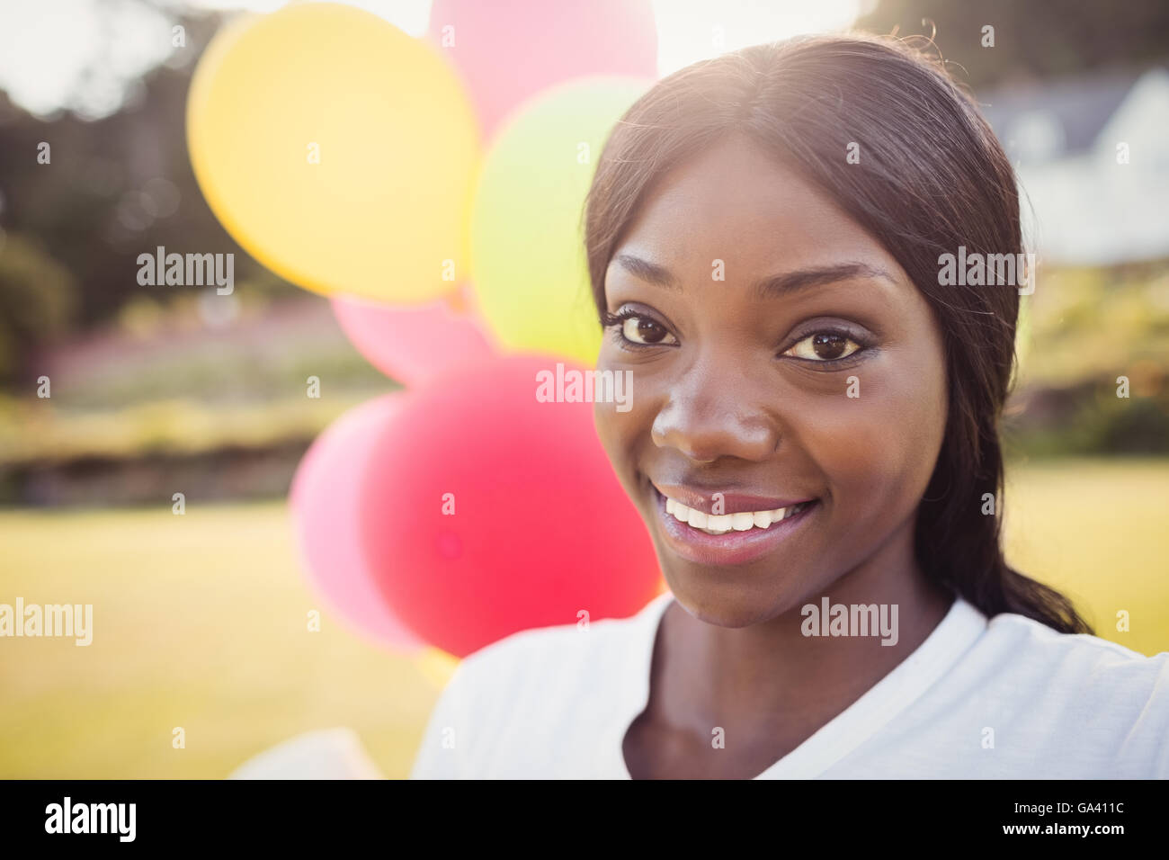 Happy woman posing alone Stock Photo - Alamy