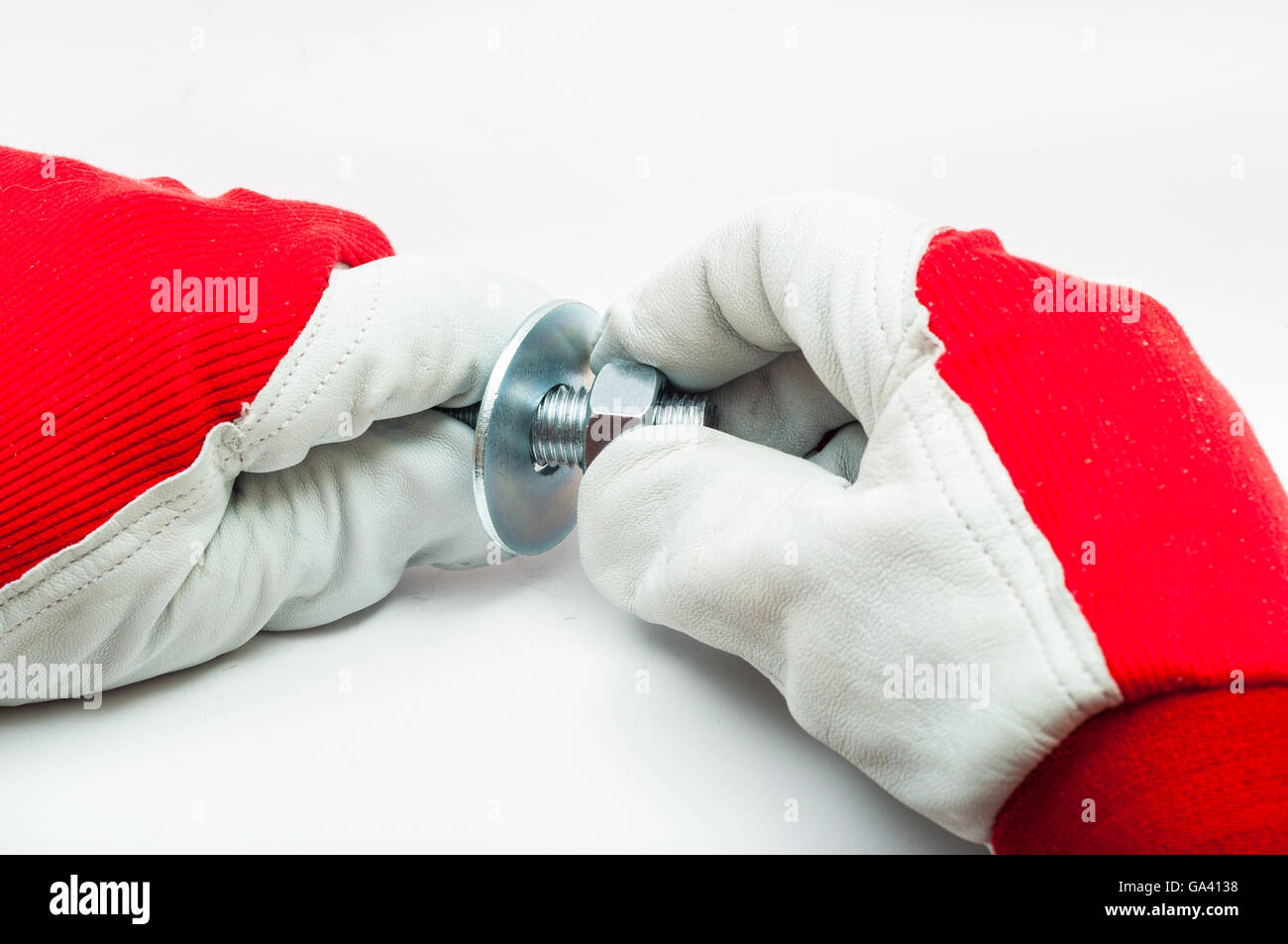 Hands holding nuts bolts hi-res stock photography and images - Alamy
