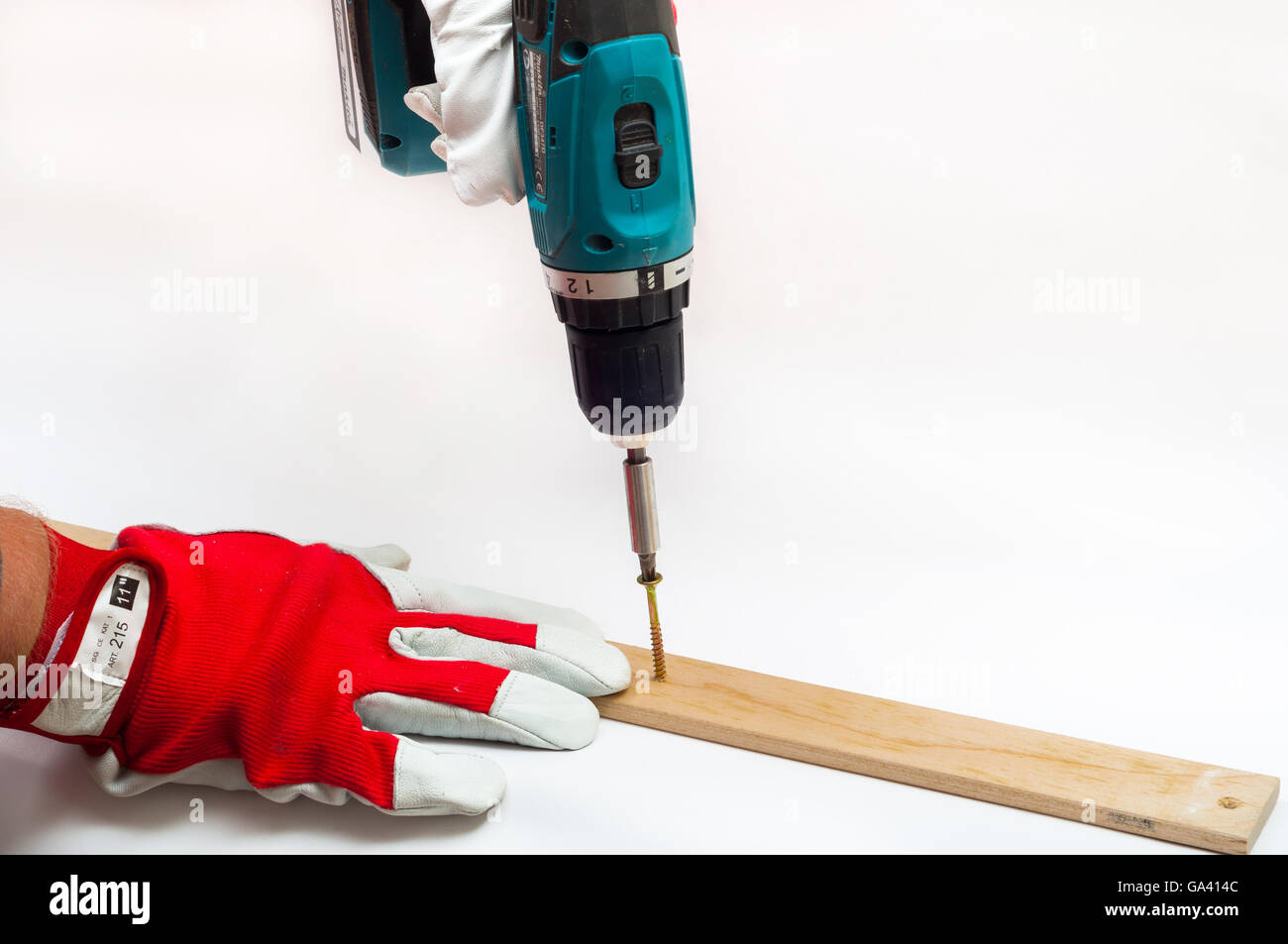 Screwing witn electrical screwdriver Stock Photo - Alamy