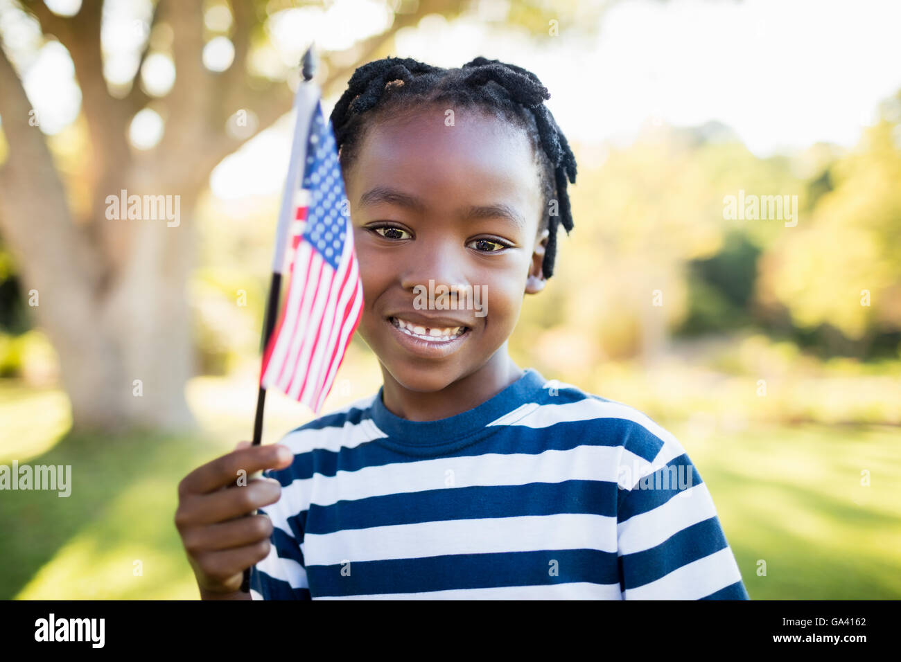 happy child showing usa flag Stock Photo - Alamy