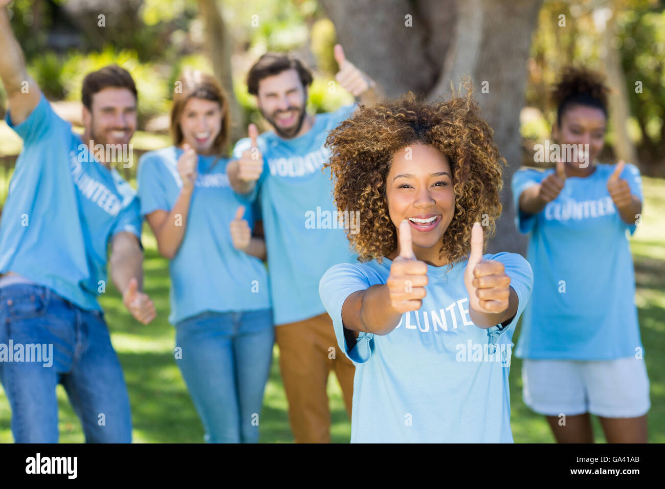 Portrait of volunteer group posing Stock Photo - Alamy