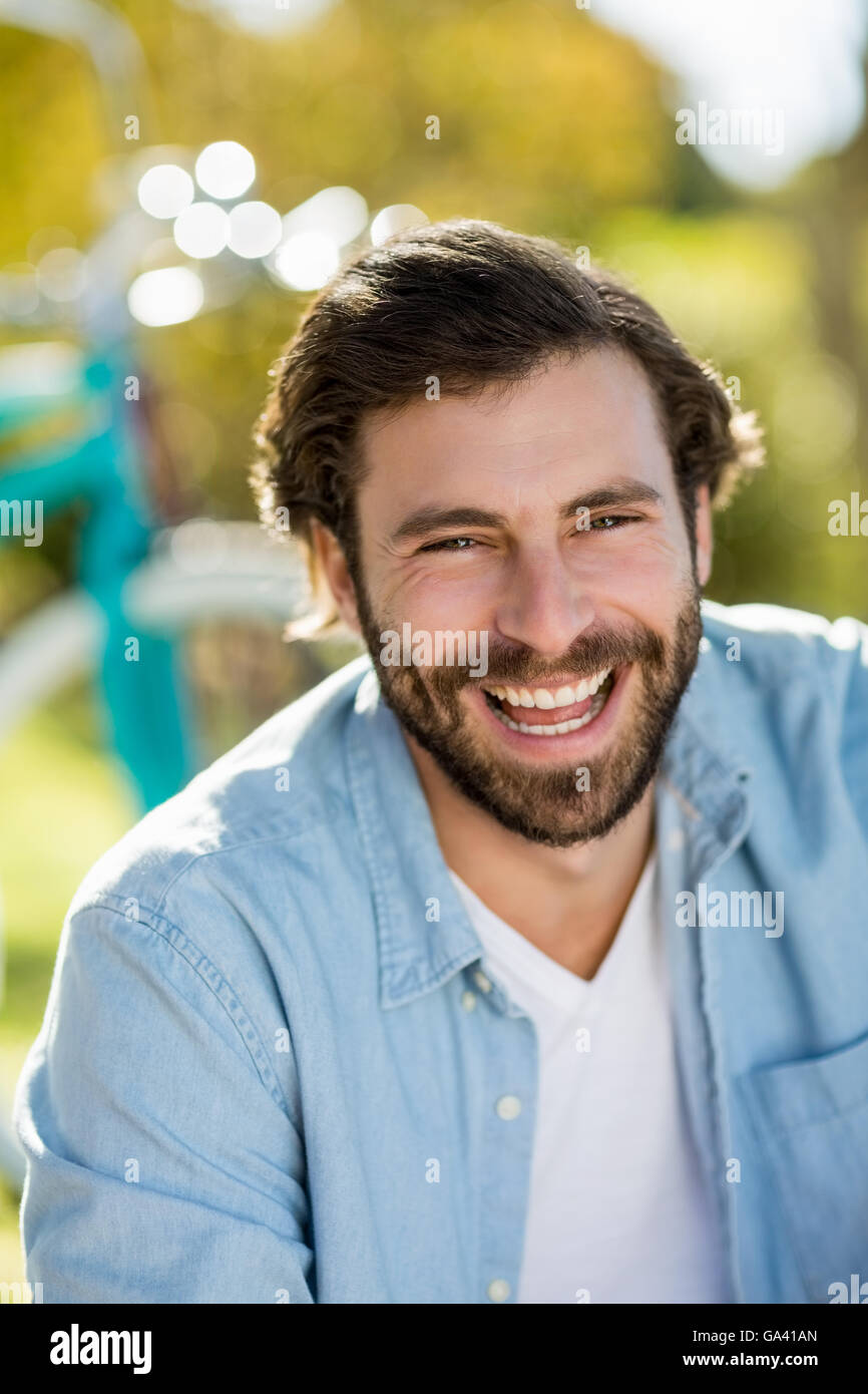 Portrait of handsome man smiling at camera Stock Photo - Alamy