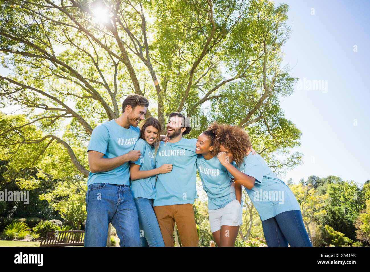 Group of volunteer having fun Stock Photo - Alamy