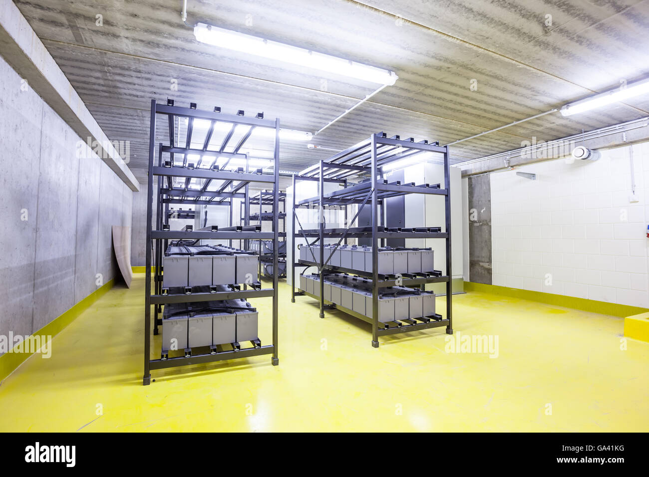 in the basement in an special room there are battery stacked Stock ...