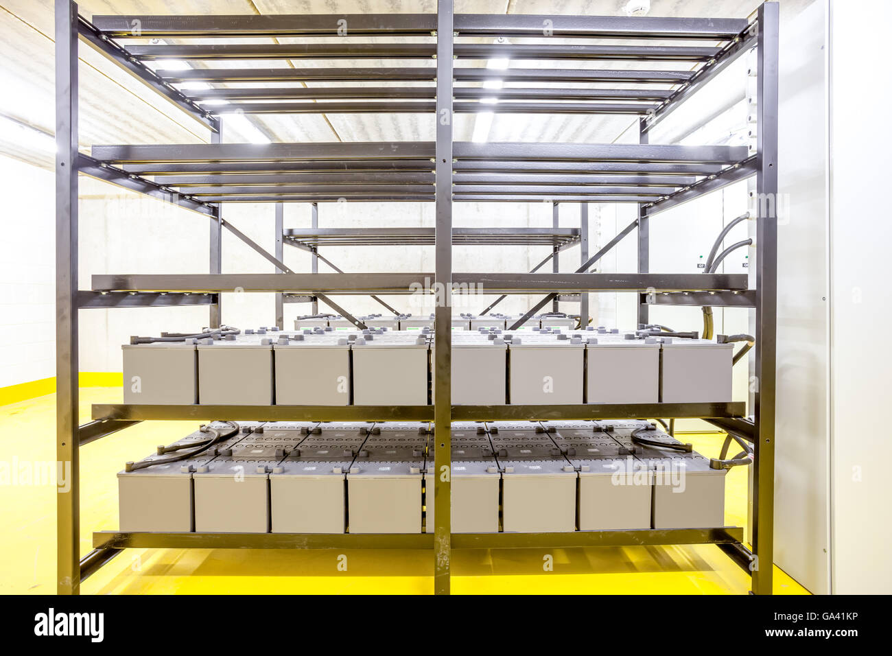 in the basement in an special room there are battery stacked Stock ...