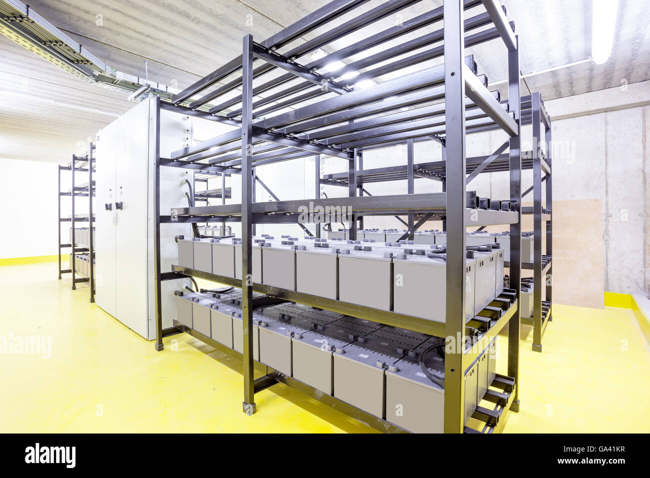 in the basement in an special room there are battery stacked Stock ...