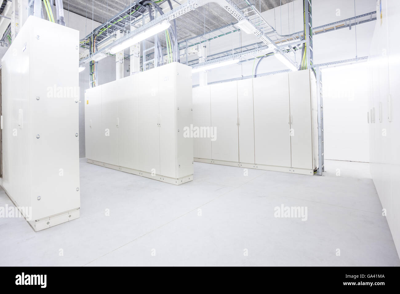 in the basement of an industrial building there is an room with ...