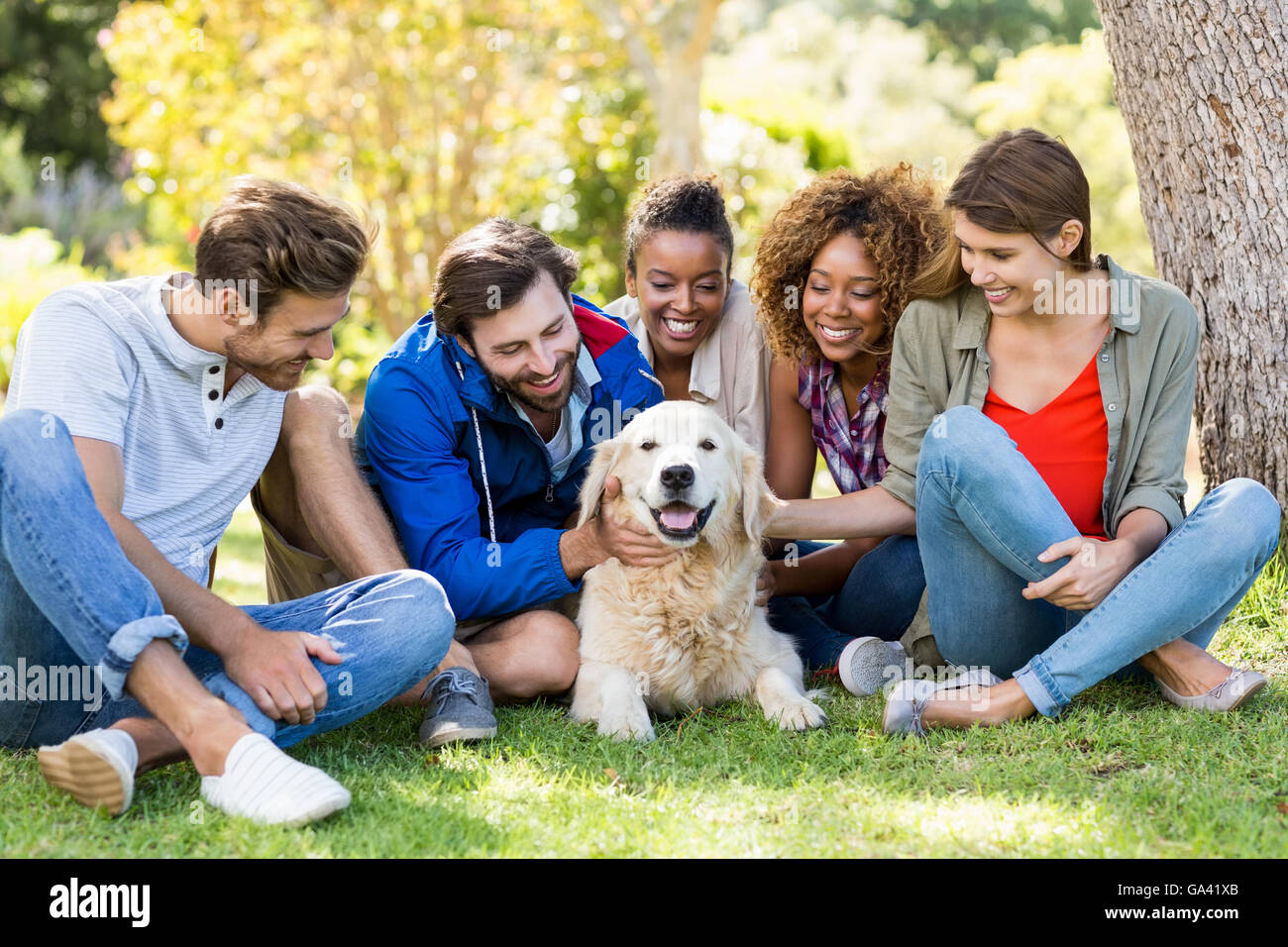 Group young friends dog hi-res stock photography and images - Alamy
