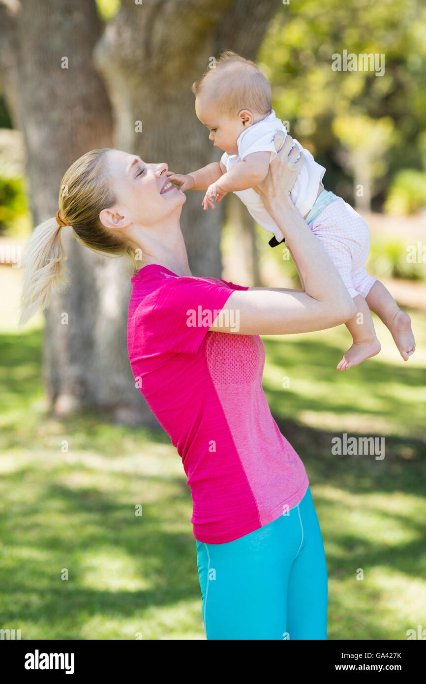 Woman standing baby hi-res stock photography and images - Alamy