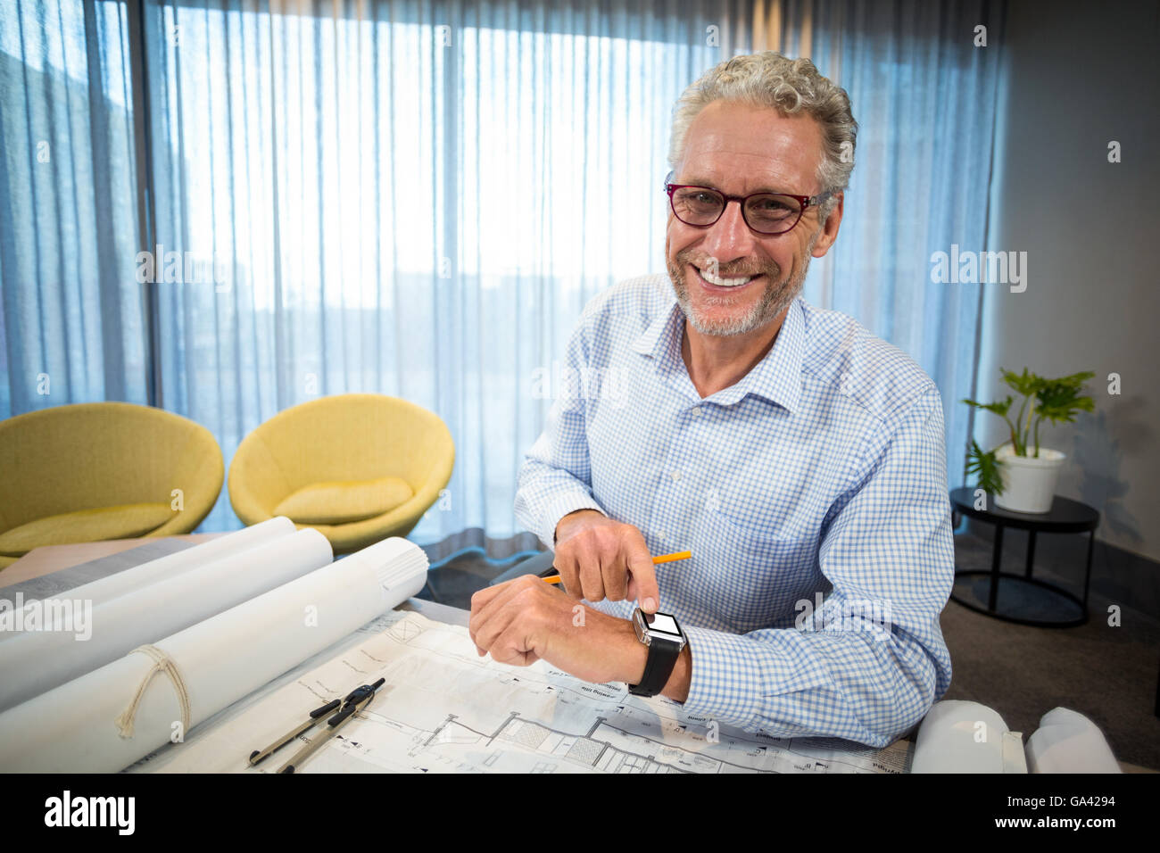 Man adjusting time on his watch Stock Photo - Alamy