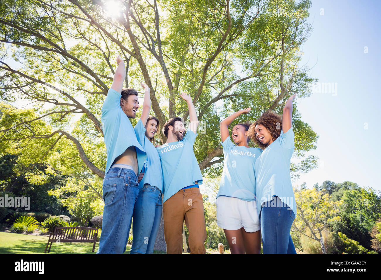 Group of volunteer having fun Stock Photo - Alamy