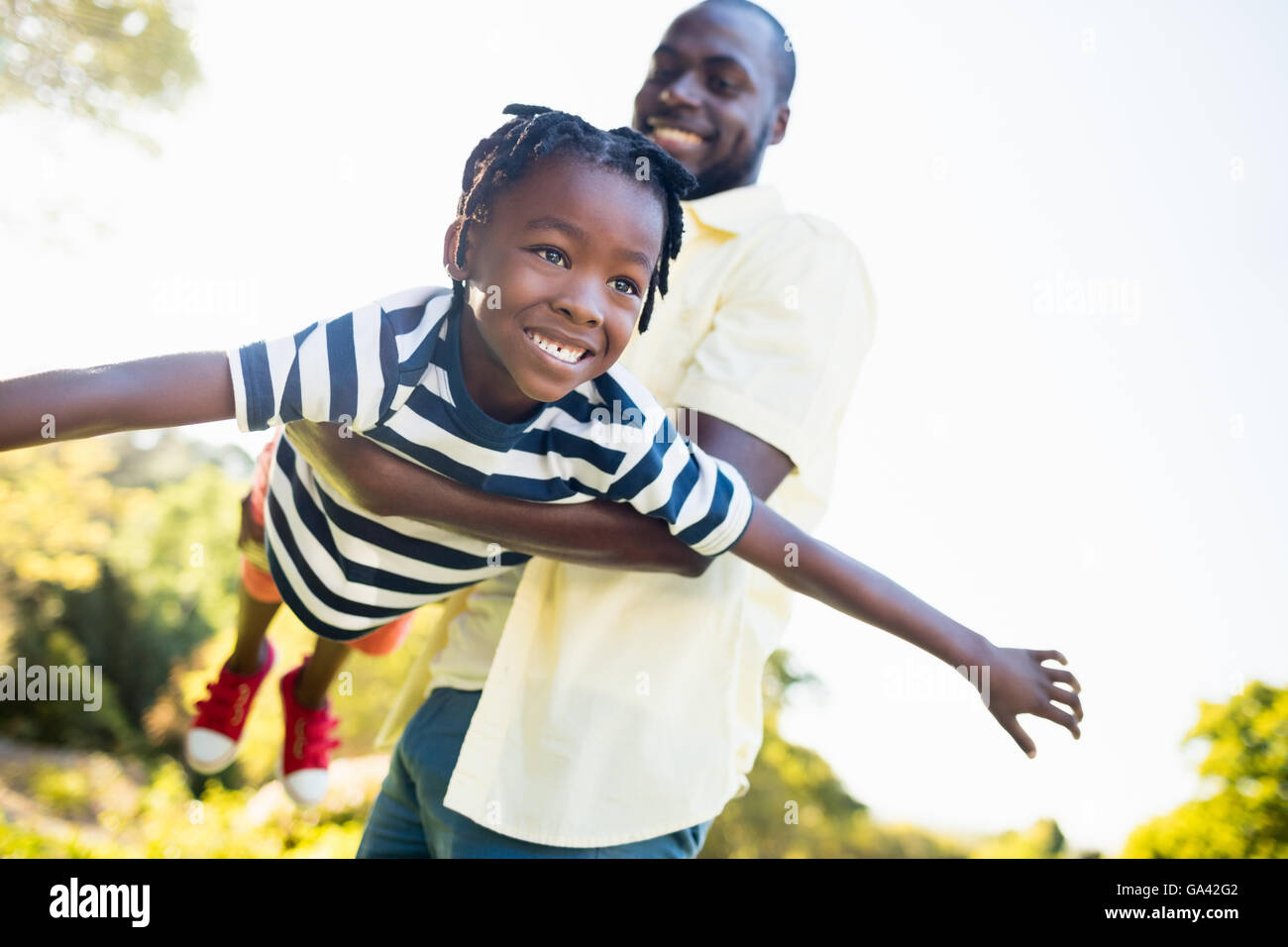 Happy family enjoying together Stock Photo - Alamy Happy family enjoying together Stock Photo - Alamy