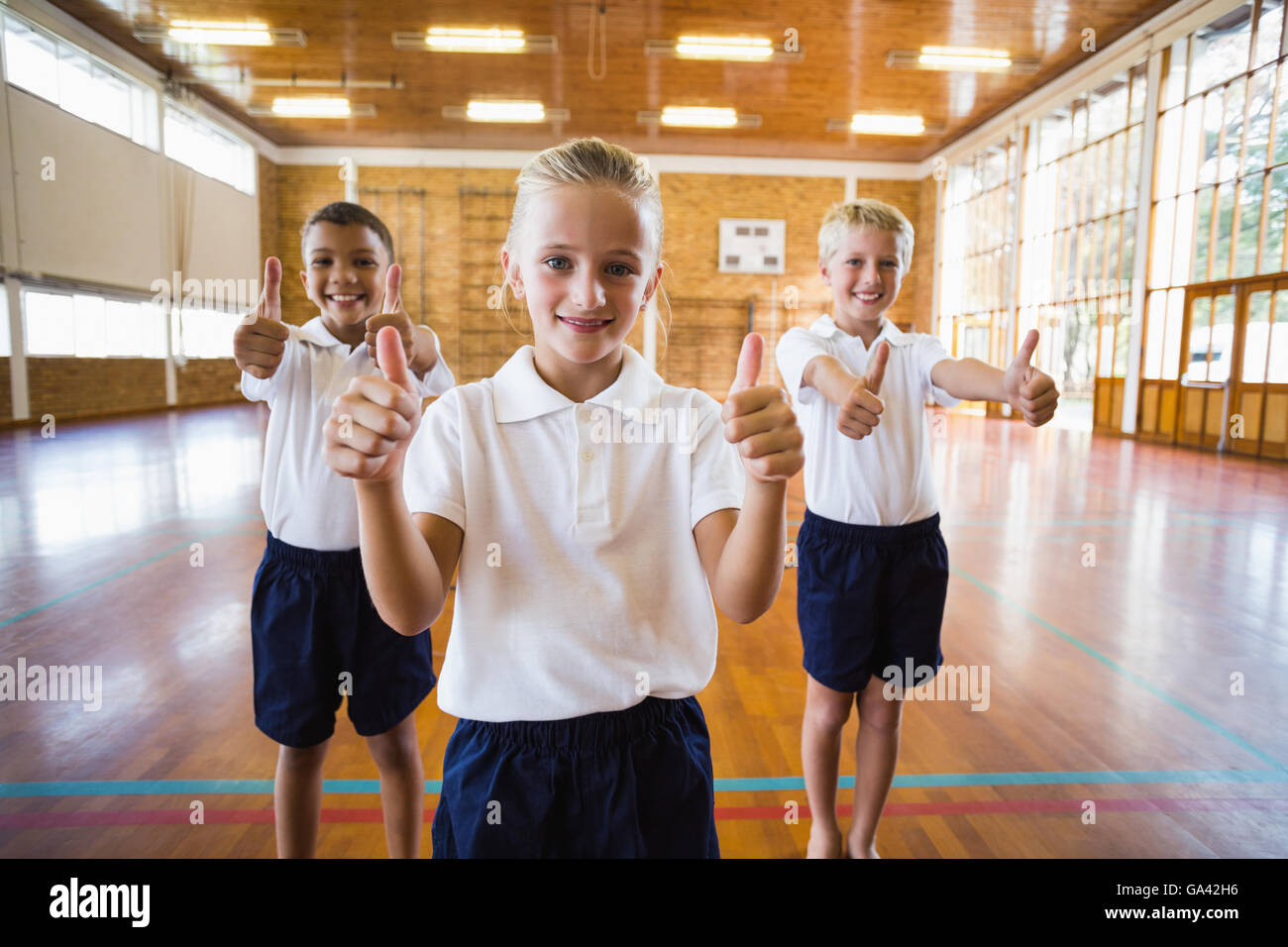 Students showing thumbs up school hi-res stock photography and images ...