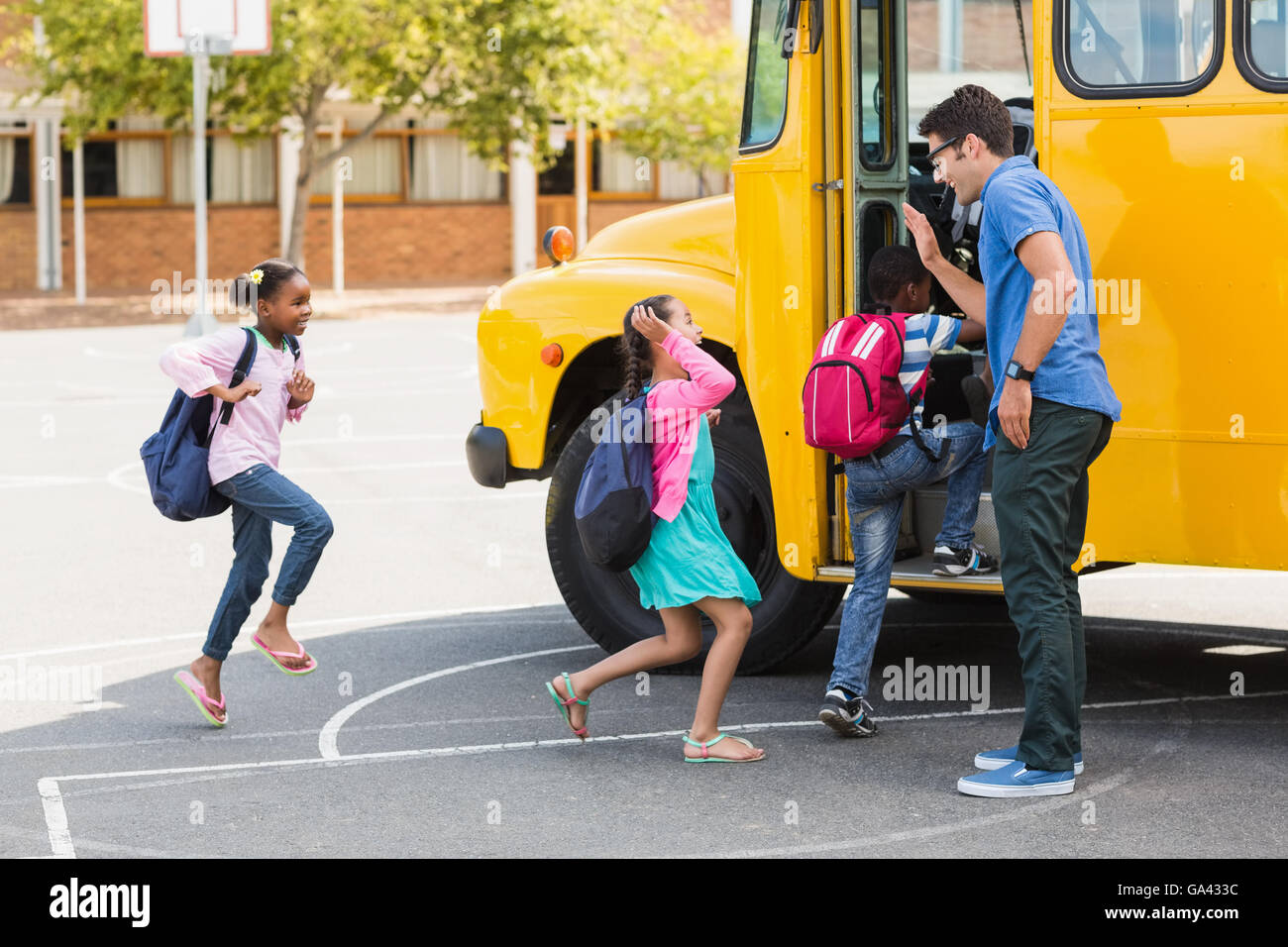 Kids entering school hi-res stock photography and images - Alamy
