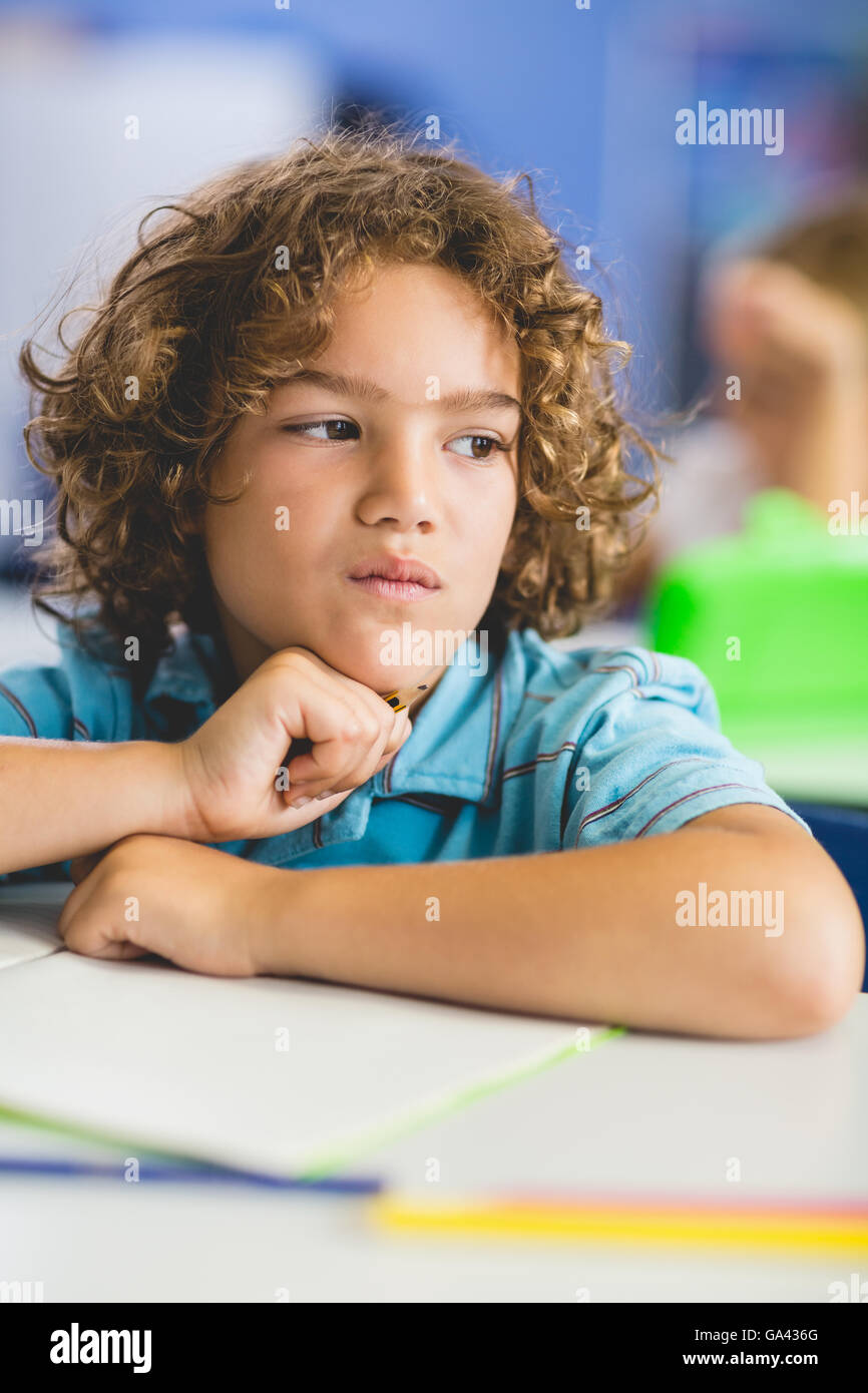 Thoughtful boy looking away hi-res stock photography and images - Alamy