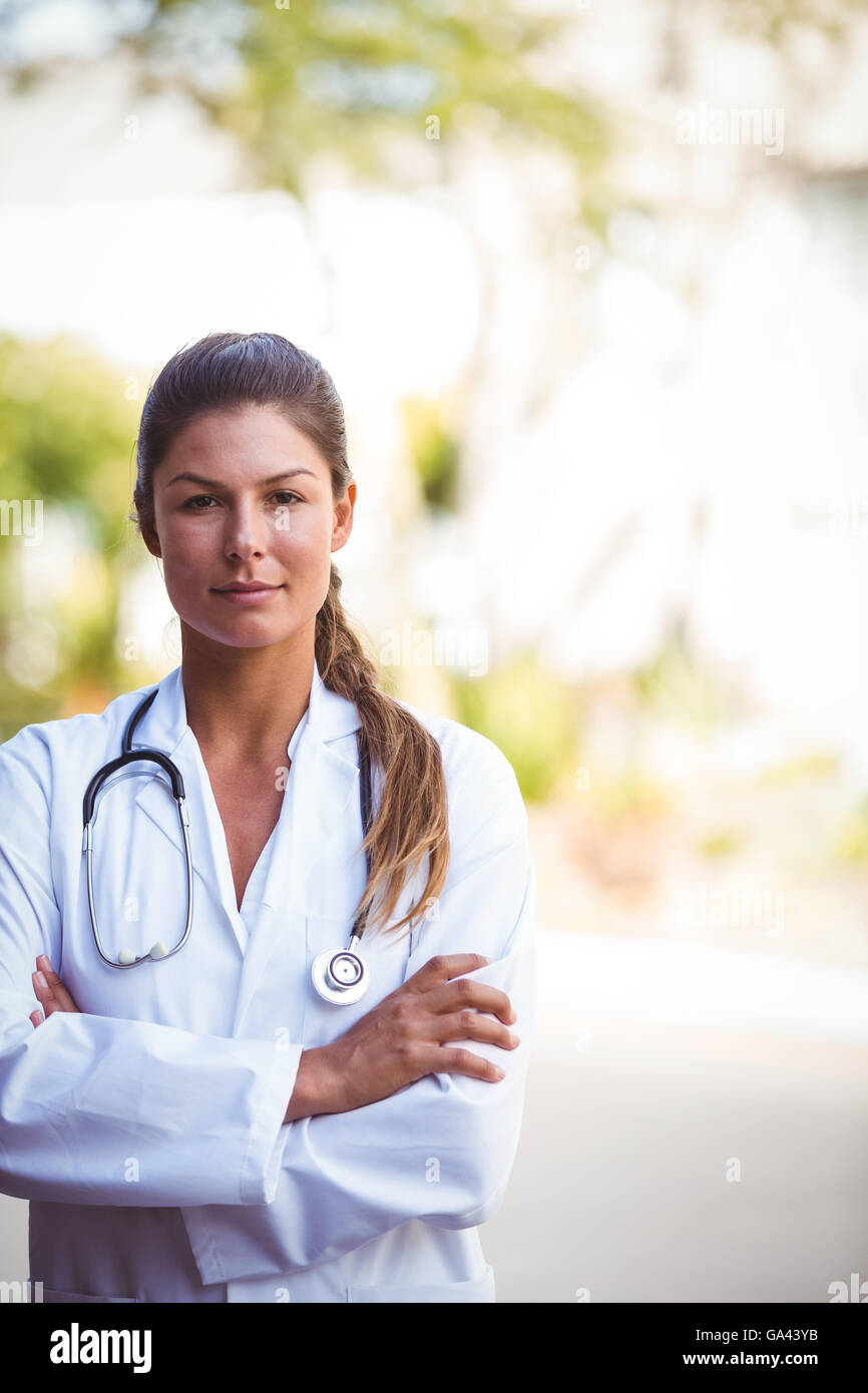 Portrait of a nurse with a serious look and arms crossed Stock Photo ...