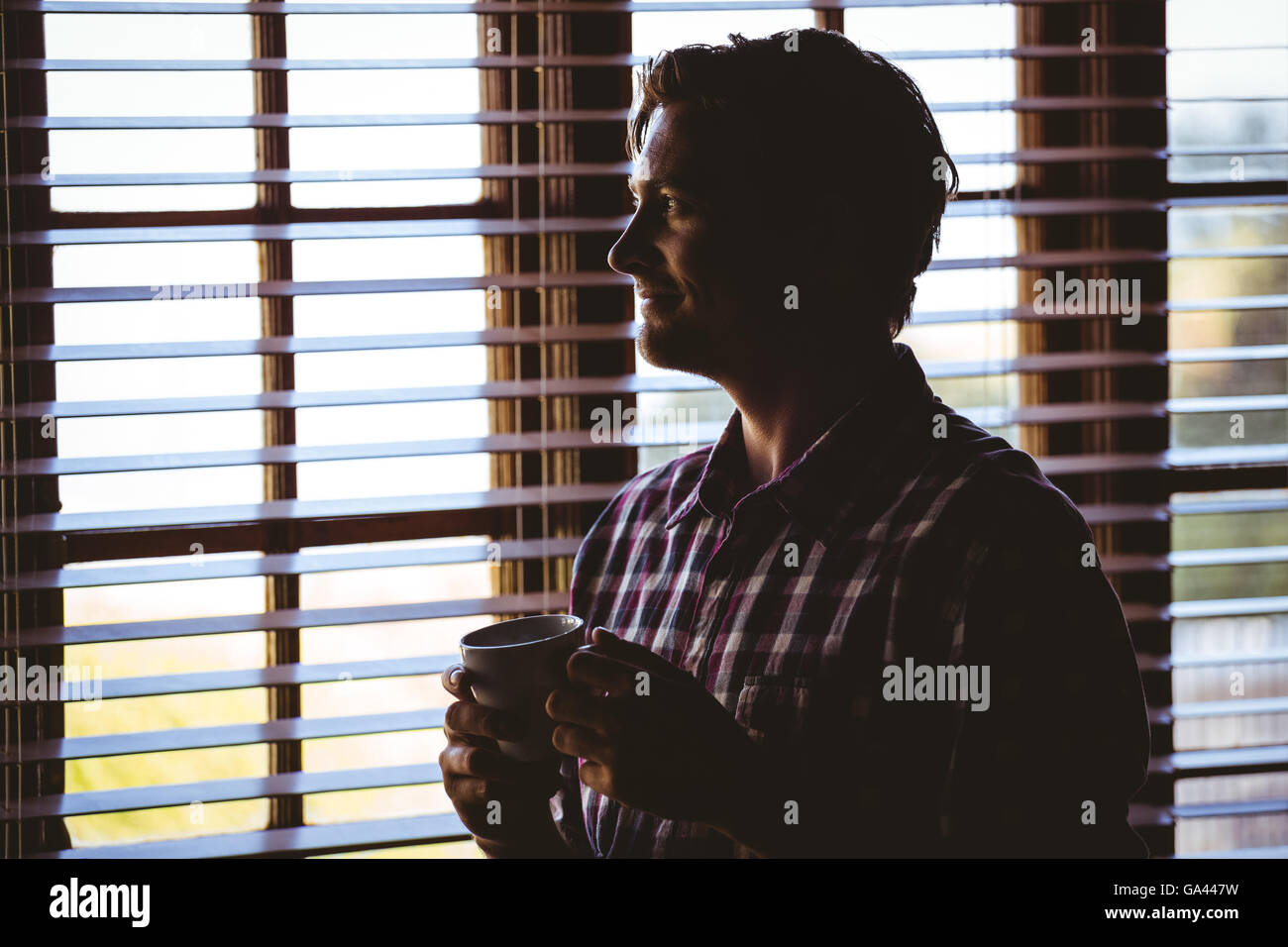 Man drinking a coffee alone Stock Photo - Alamy