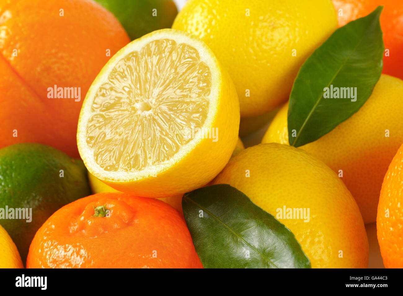 heap of fresh citrus fruit - close up Stock Photo - Alamy